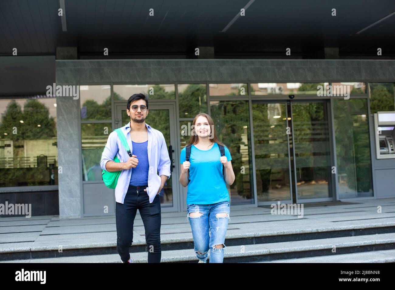 Two boys walking together school hi-res stock photography and images ...