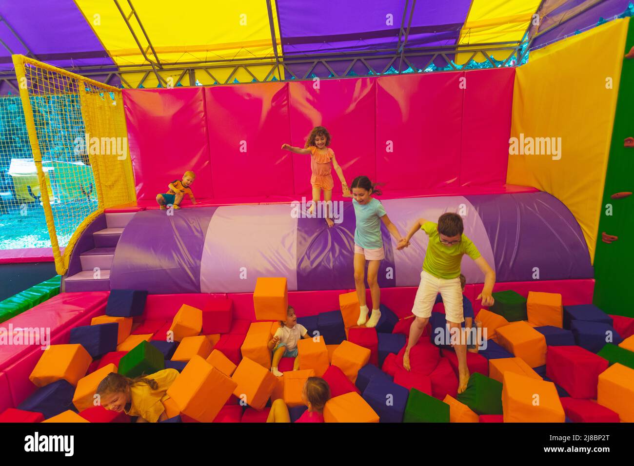 The children have a great time together in the trampoline park Stock ...