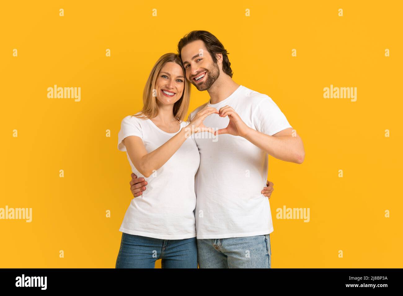 Happy Attractive Millennial European Wife And Husband With Stubble In