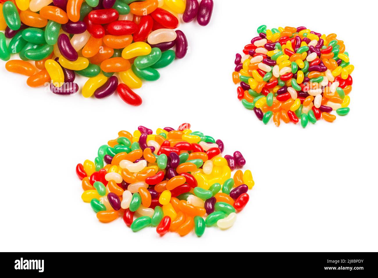 Colorful jelly beans isolated on white Stock Photo - Alamy