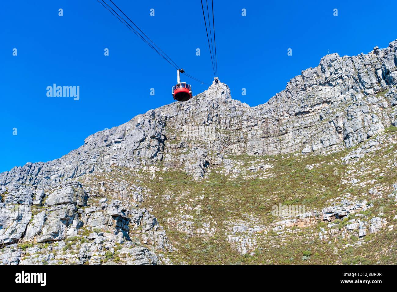 High place on the blue sky background, hard mountain Stock Photo - Alamy