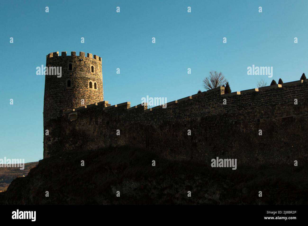 Castle wall. Fortress in mountains. Ancient building. Fortress in ...