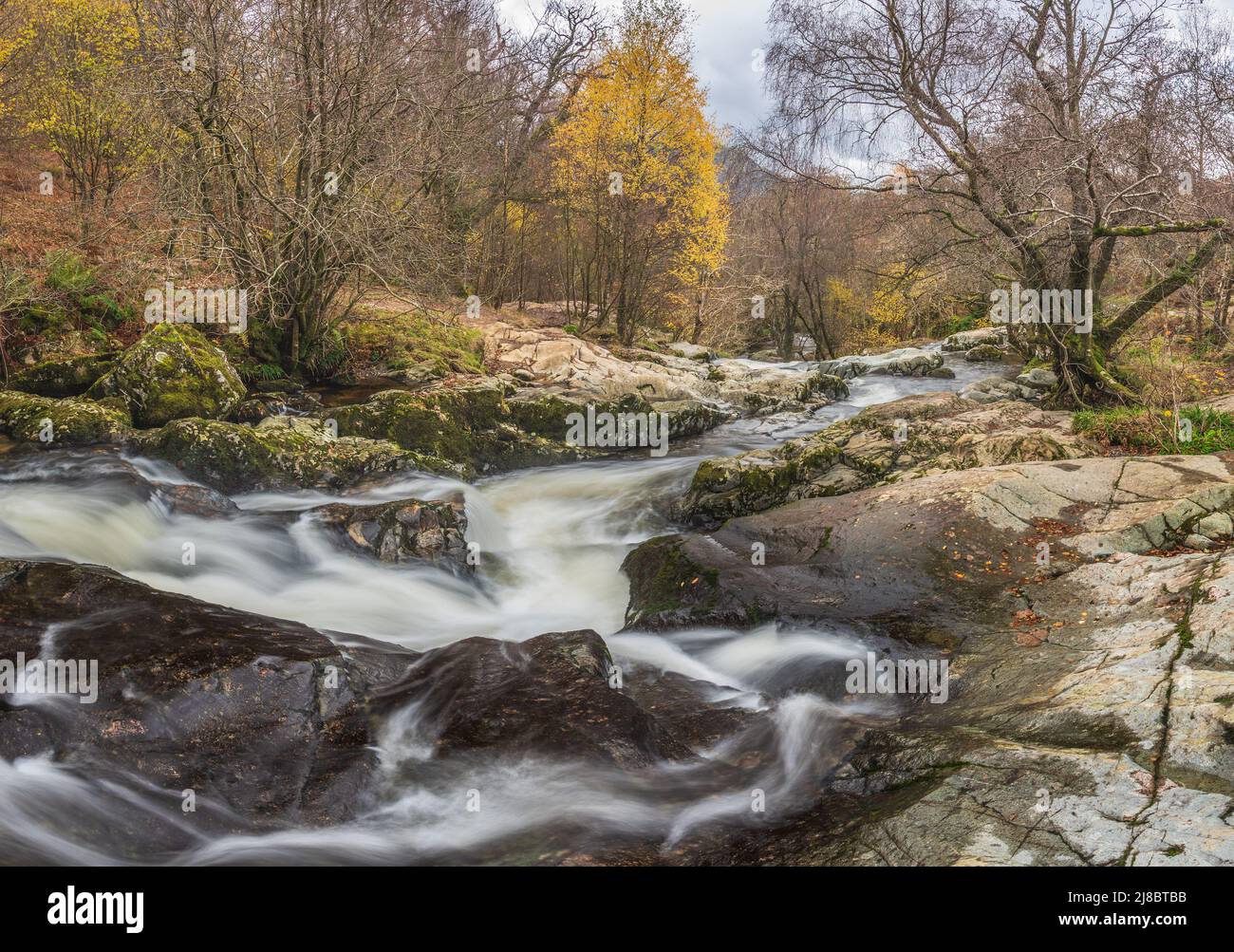 Epic landscape image of Aira Force Upper Falls in Lake District during ...