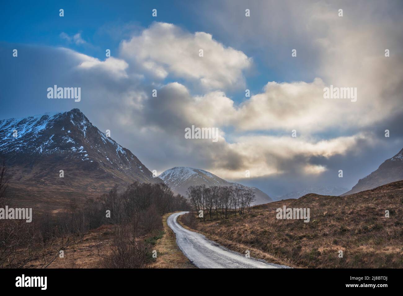 Beautiful Winter sunset landscape of Etive Mor road leading between the ...