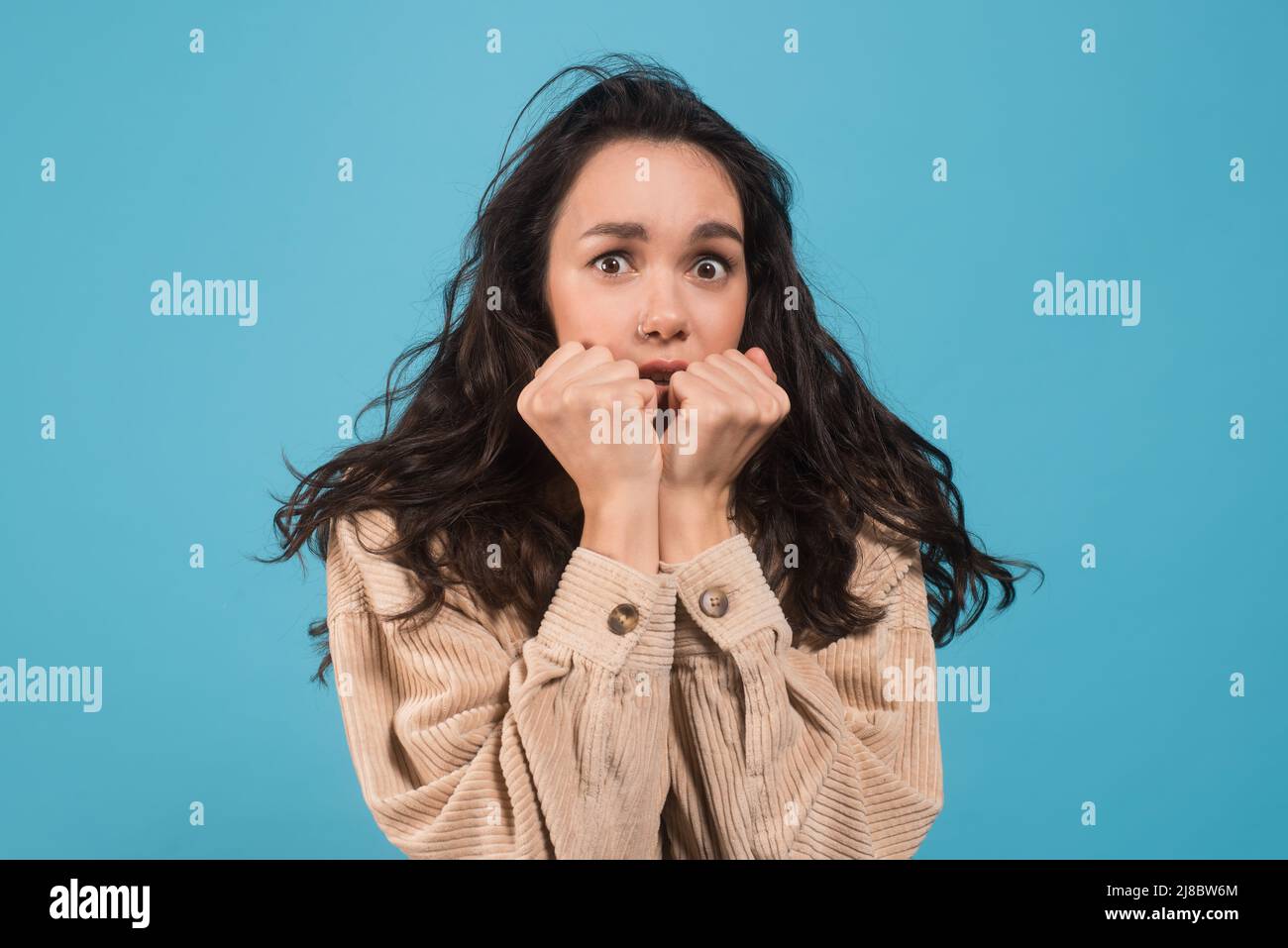 Scared female face hi-res stock photography and images - Alamy