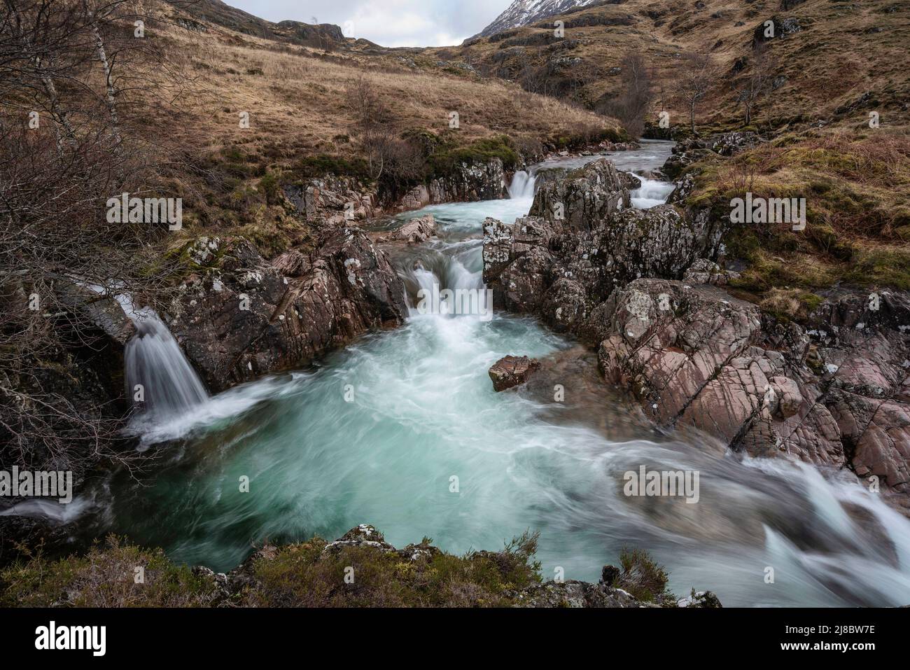 Beautiful landscape image of vibrant River Coe flowing beneath ...