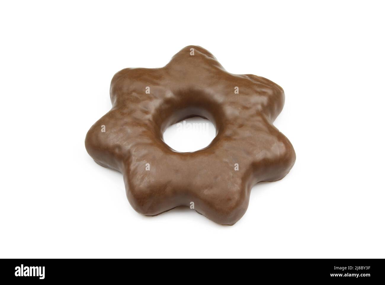 Single star shaped gingerbread biscuit covered in chocolate and ...