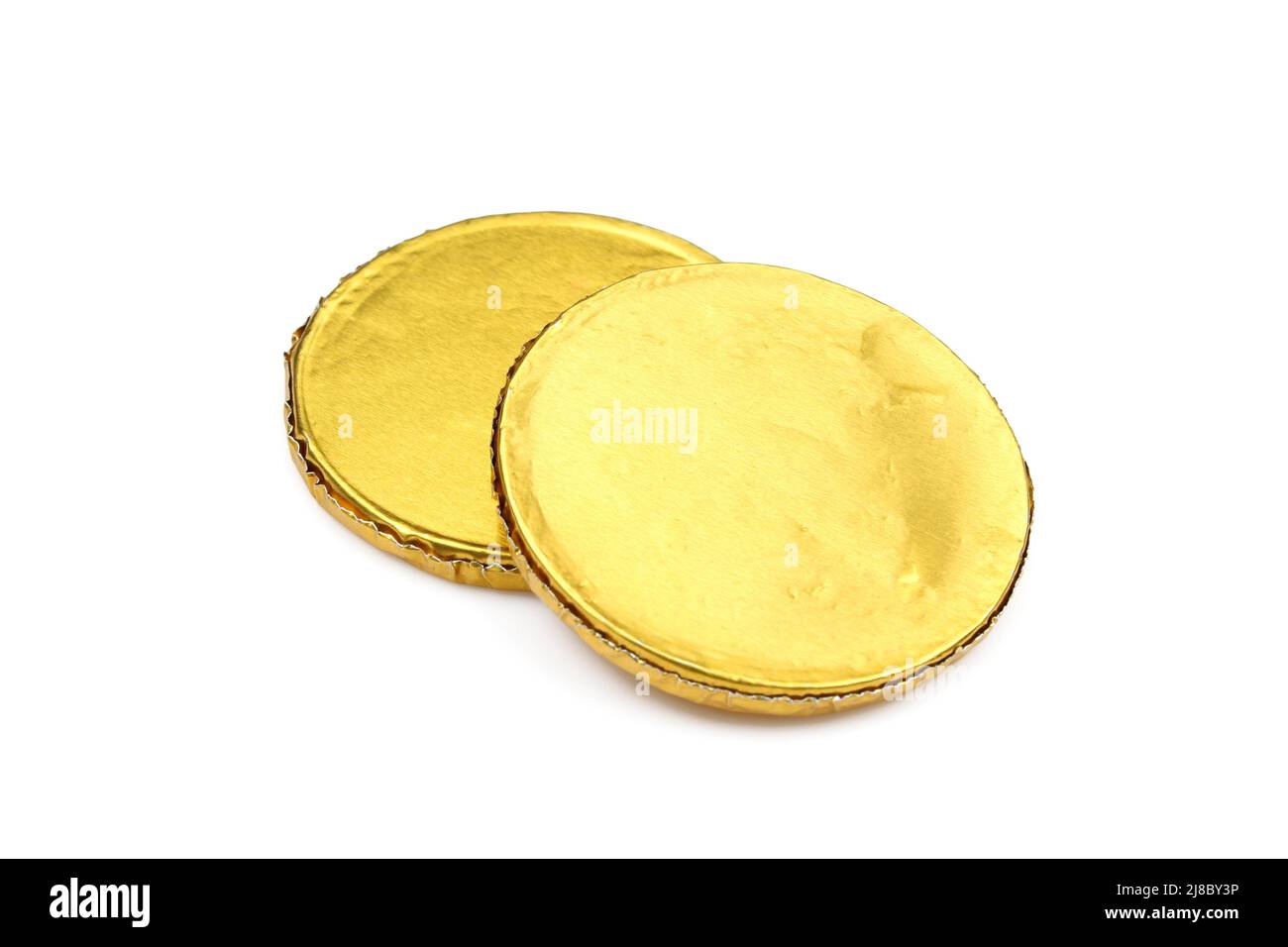 Chocolate sweets wrapped in yellow foil. Fake dessert coins Stock Photo ...
