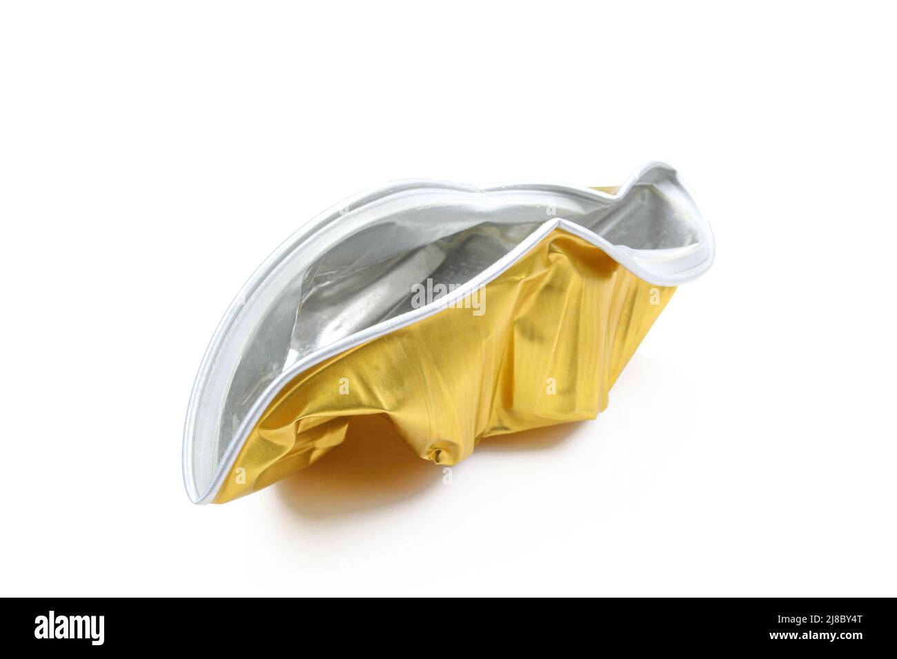 Crumpled food tin can isolated on white background Stock Photo - Alamy