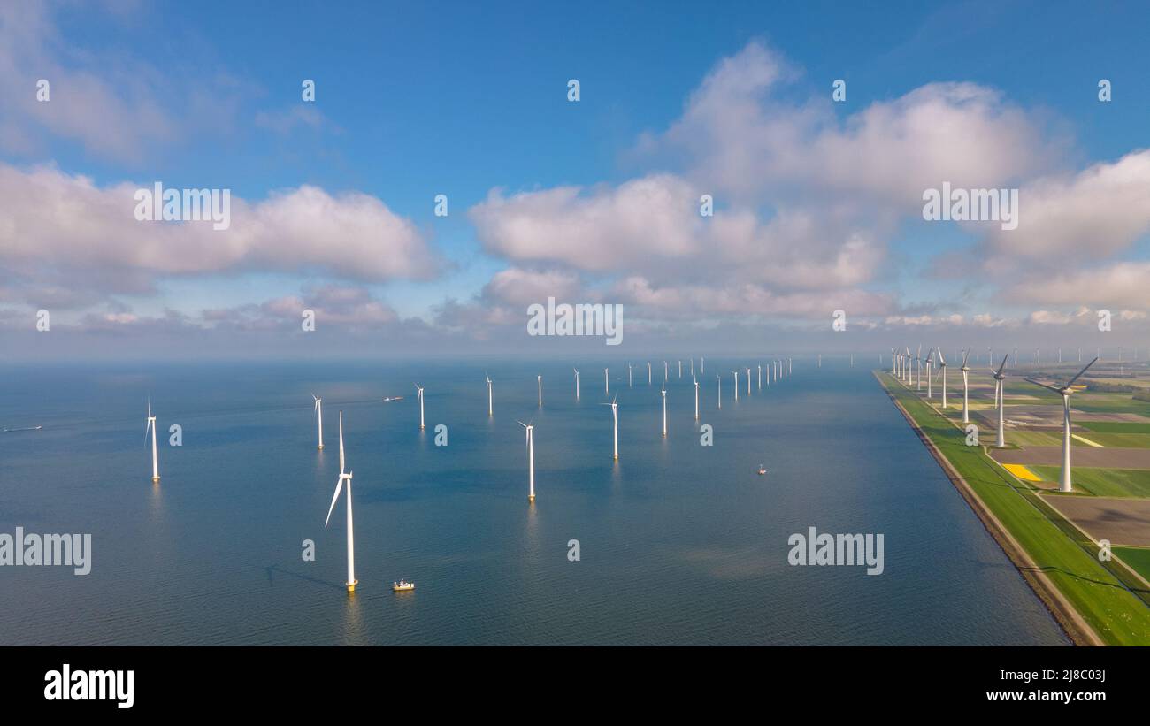 Offshore Windmill farm in the ocean Westermeerwind park, windmills ...