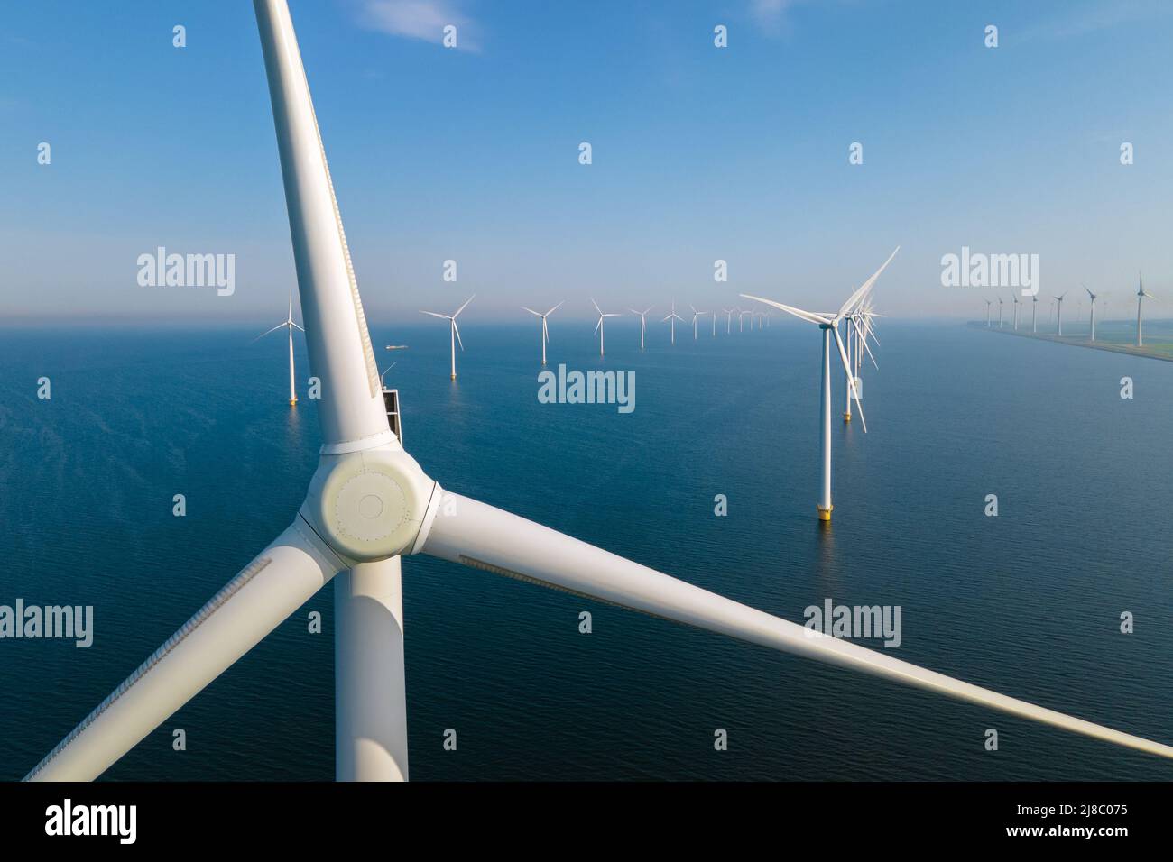 Offshore Windmill farm in the ocean Westermeerwind park, windmills ...