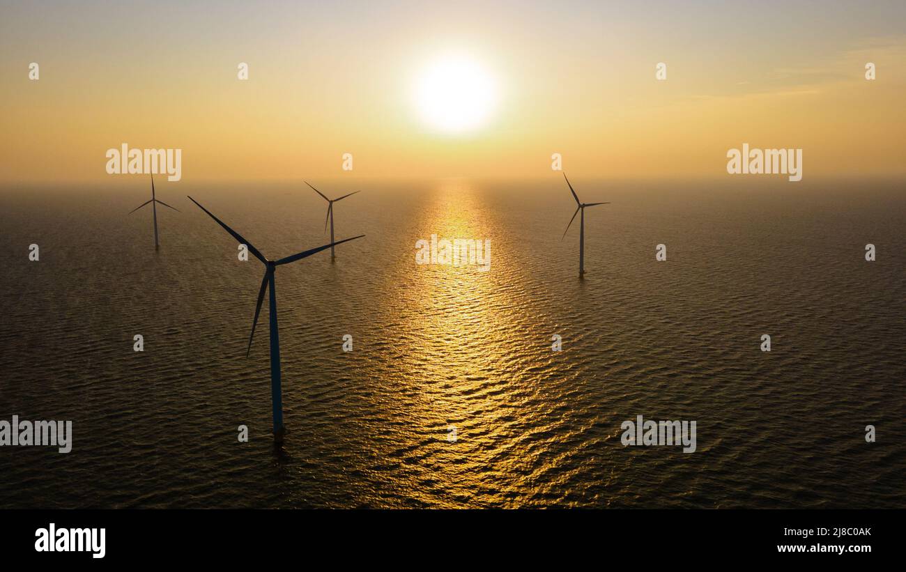 Offshore Windmill farm in the ocean Westermeerwind park, windmills ...
