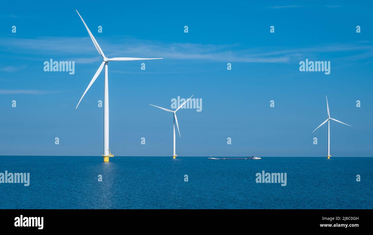 Offshore Windmill farm in the ocean Westermeerwind park, windmills ...