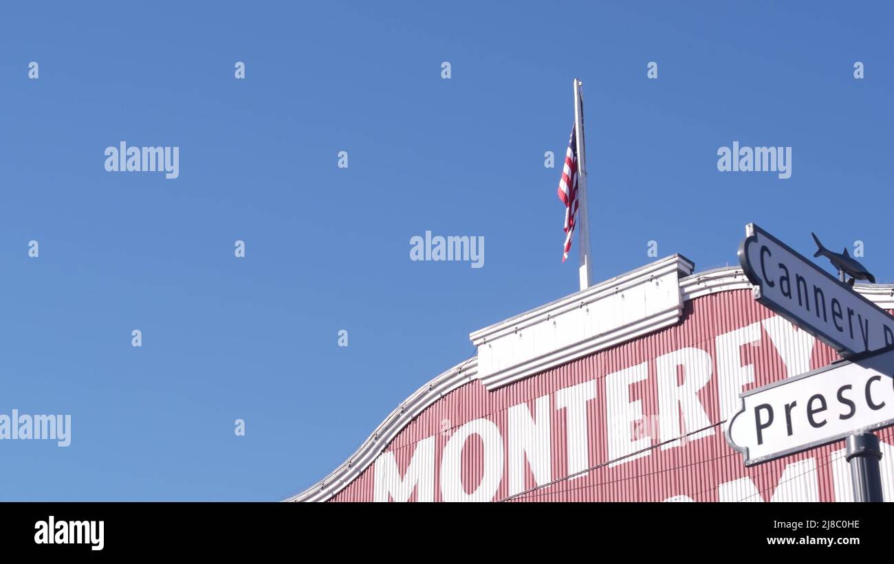 Red building, Cannery Row road sign, Monterey city, California tourist ...