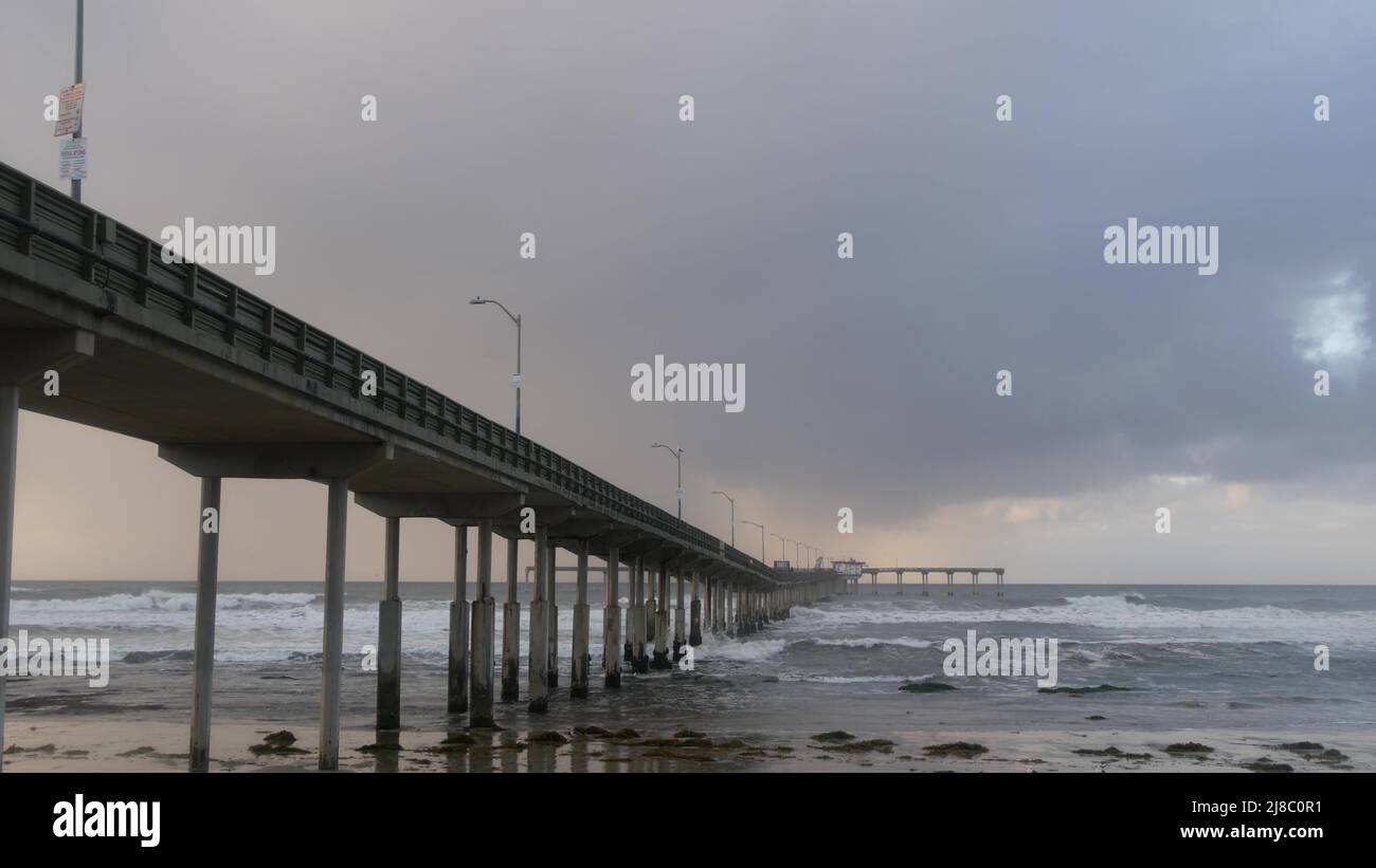 Ocean Beach pier in rainy weather, sea waves in foggy air, California ...