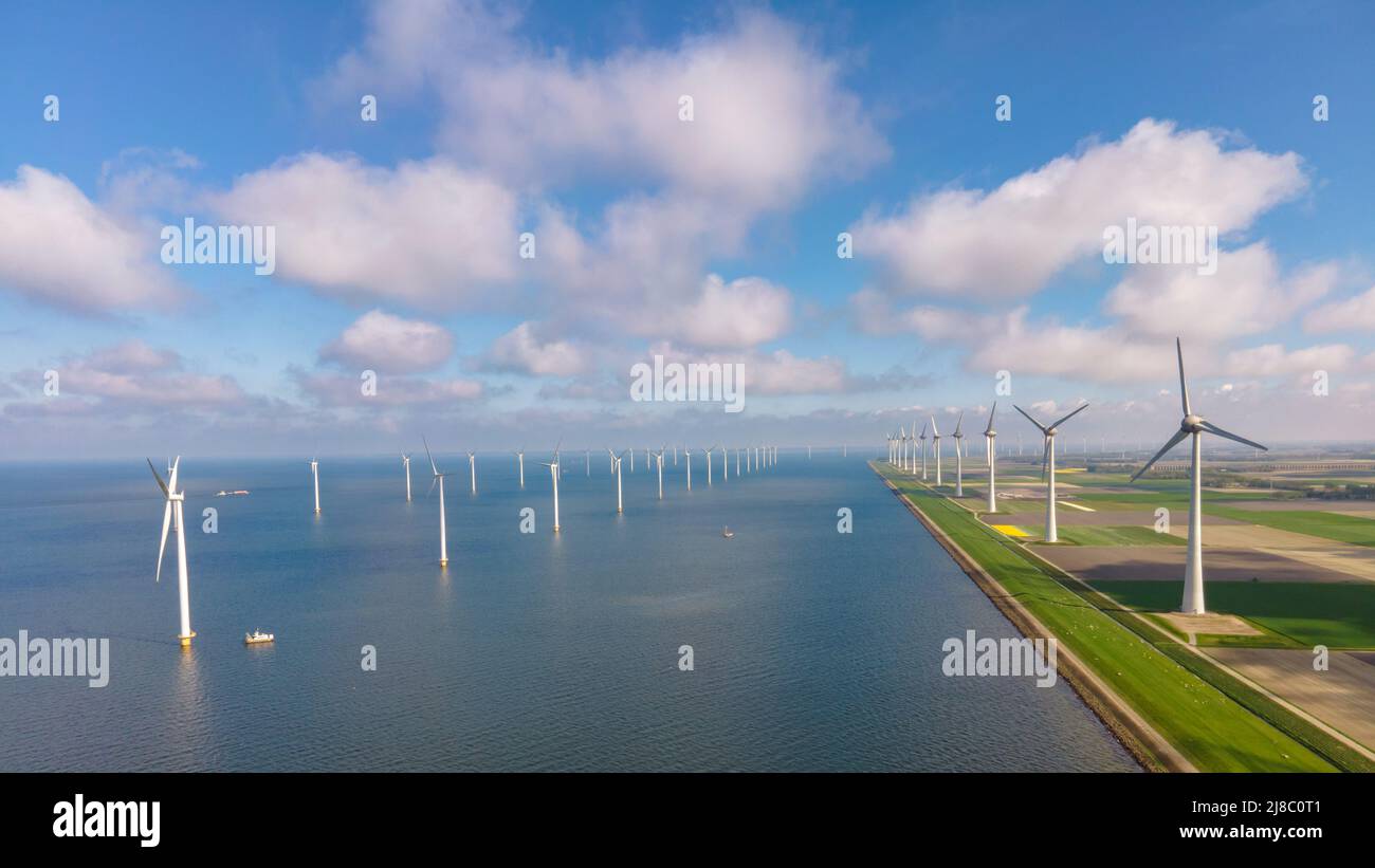 Offshore Windmill farm in the ocean Westermeerwind park, windmills ...