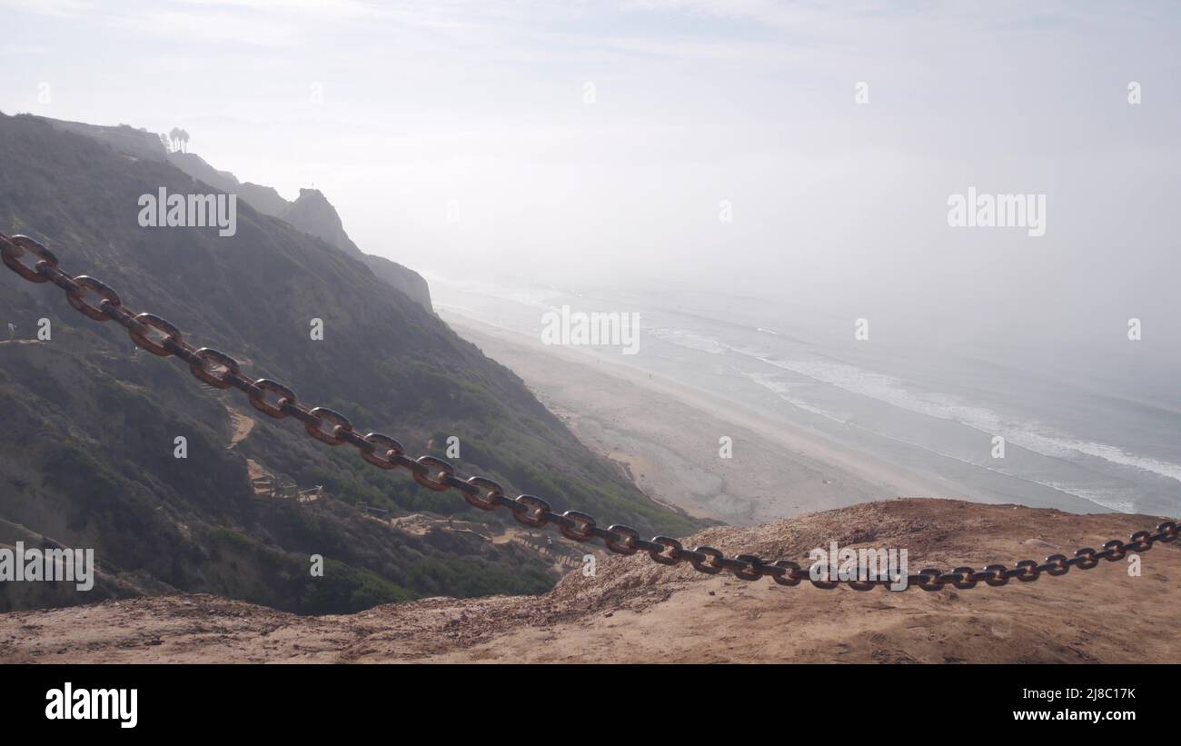 Steep unstable cliff, rock or bluff, foggy weather, California coast ...