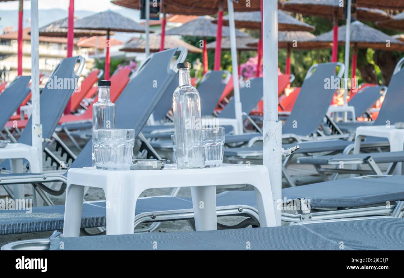 A small quiet tourist place Leptokarya in Greece. Empty glass water ...
