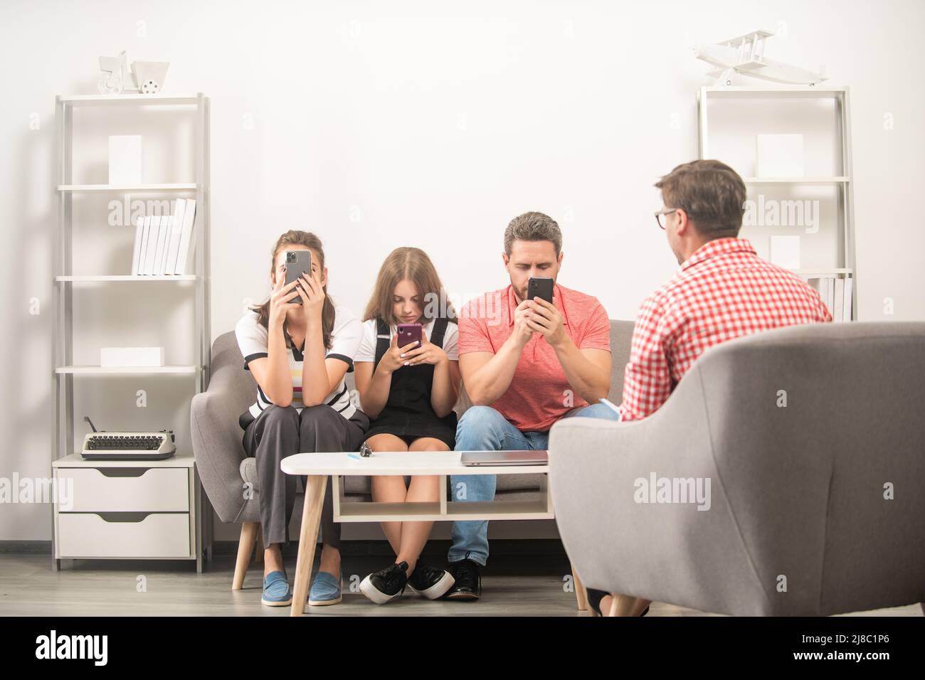 kid with phone addicted daddy and mom sitting at psychologist solving ...