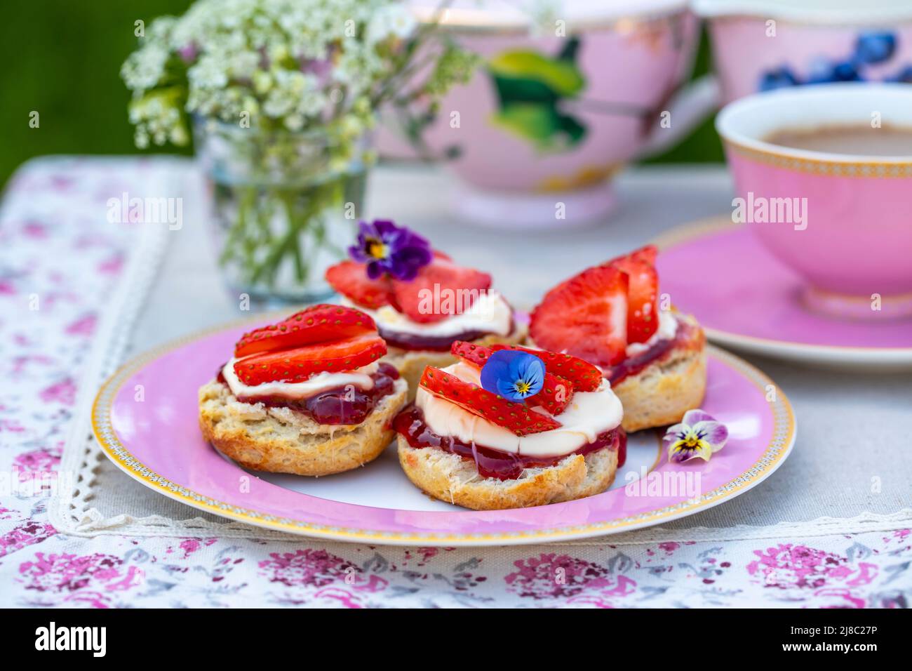 Traditional english afternoon tea with selection of cakes and ...