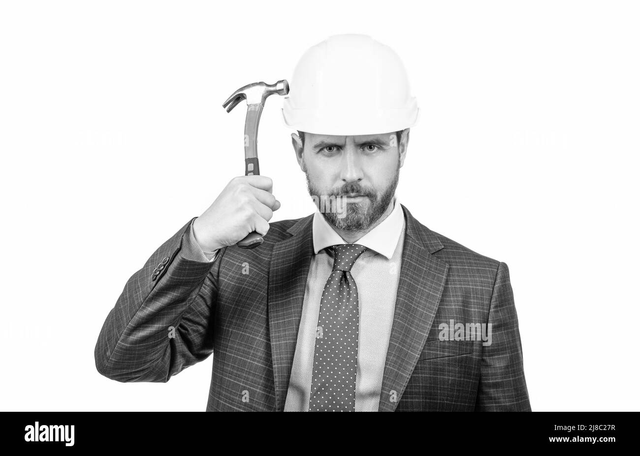 Construction worker hitting hammer Black and White Stock Photos ...
