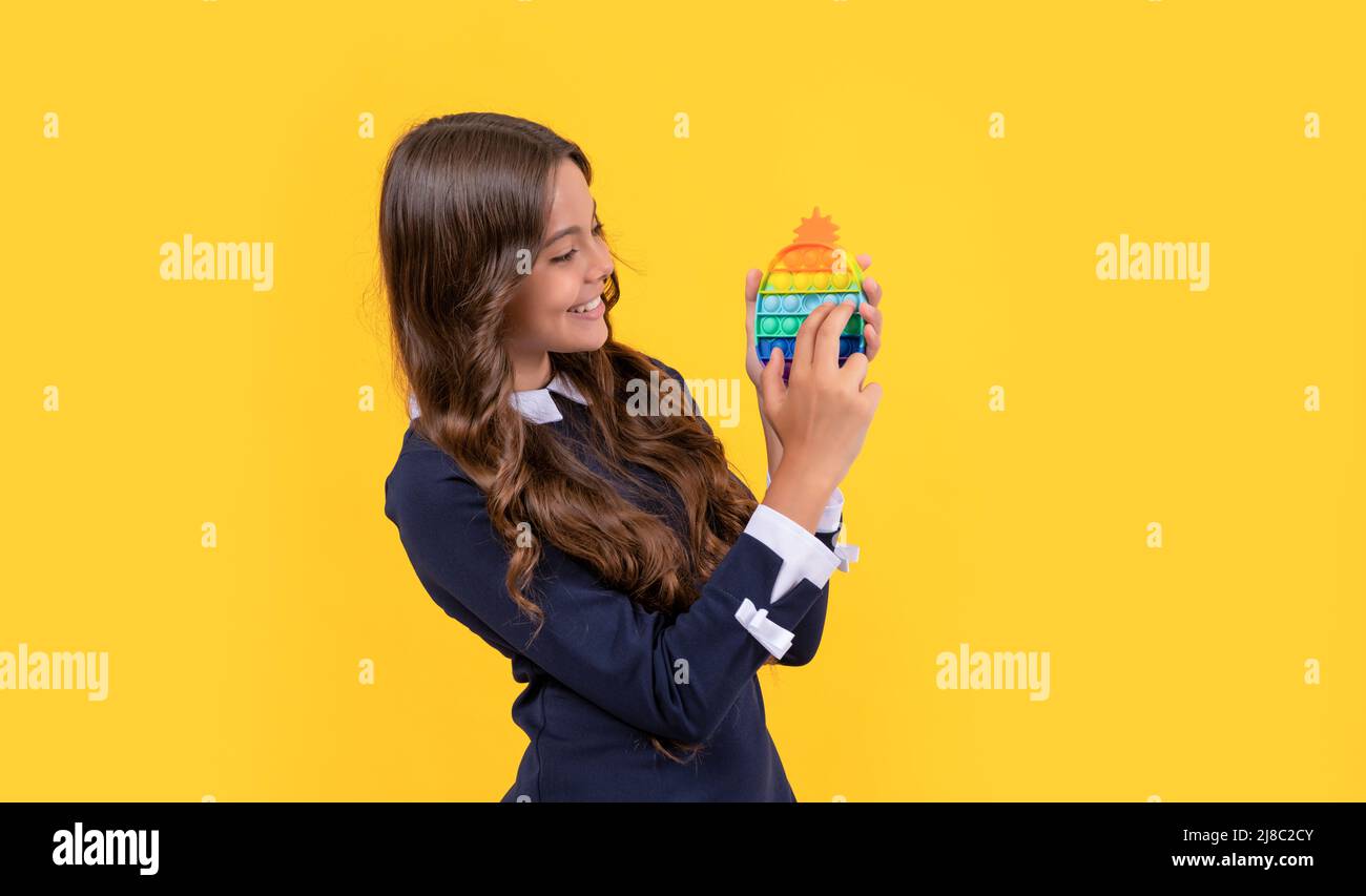 sensory fidgeting. girl with finger game. kid popping anti stress ...