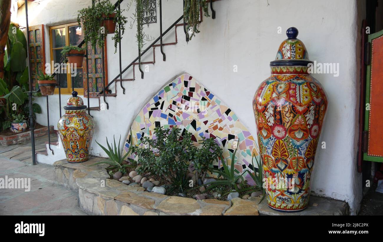 Mexican garden design in front yard, colorful ceramic painted decor ...