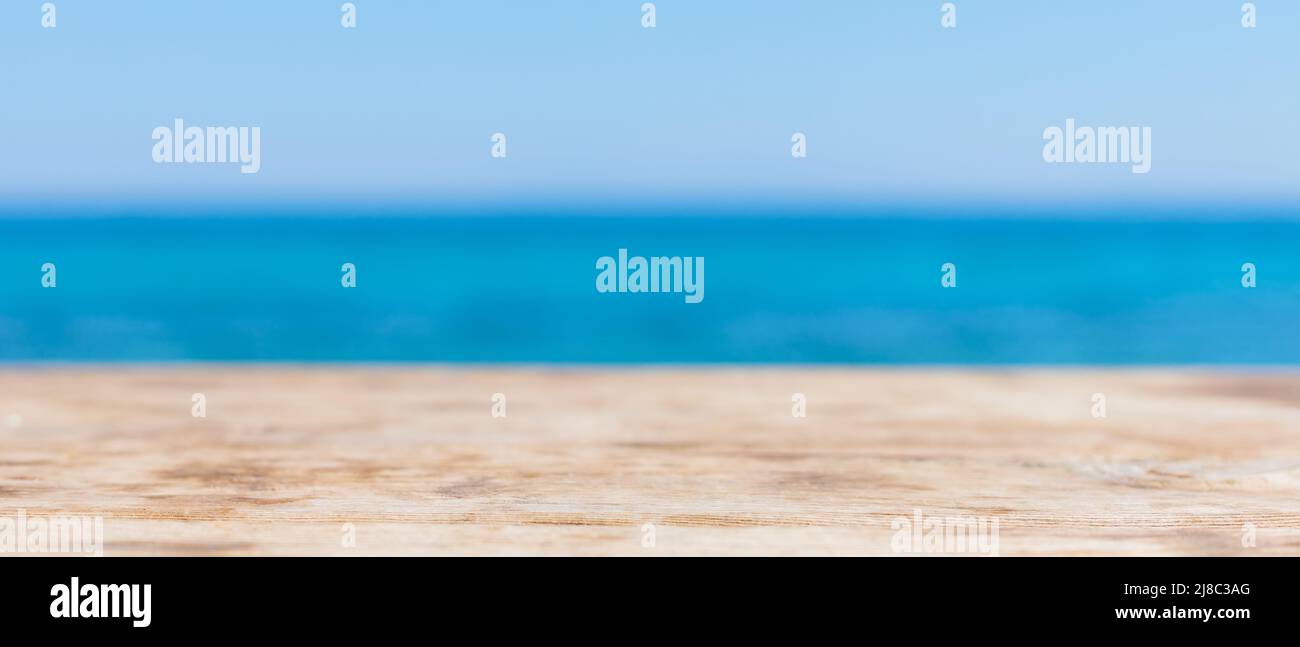 Wood table top on blur summer blue sea. Empty wooden table on the ...