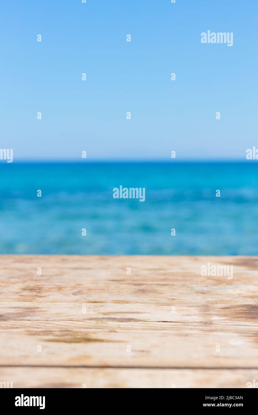 Wood table top on blur summer blue sea. Empty wooden table on the ...