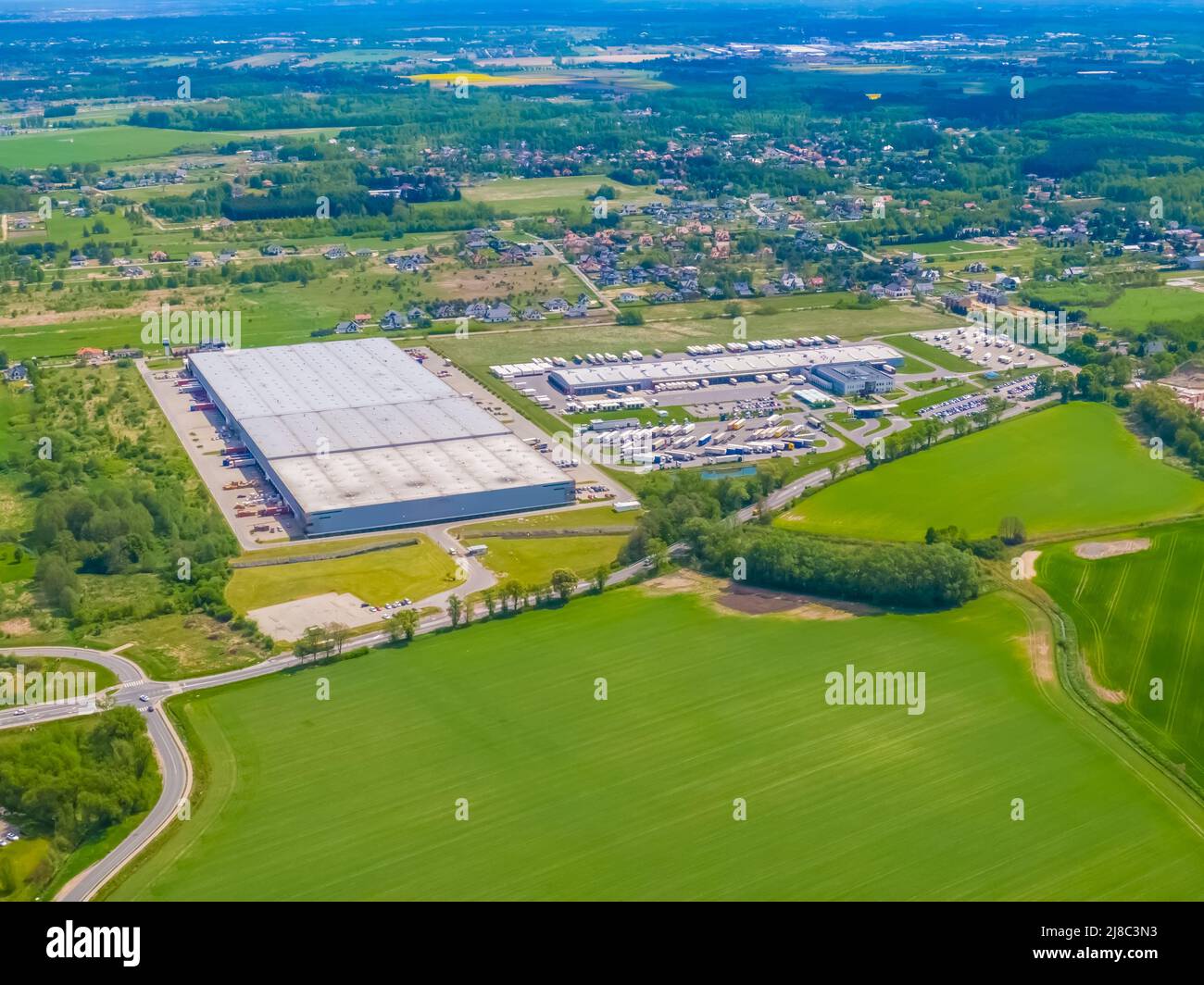 Aerial view of goods warehouse. Logistics center in industrial city ...