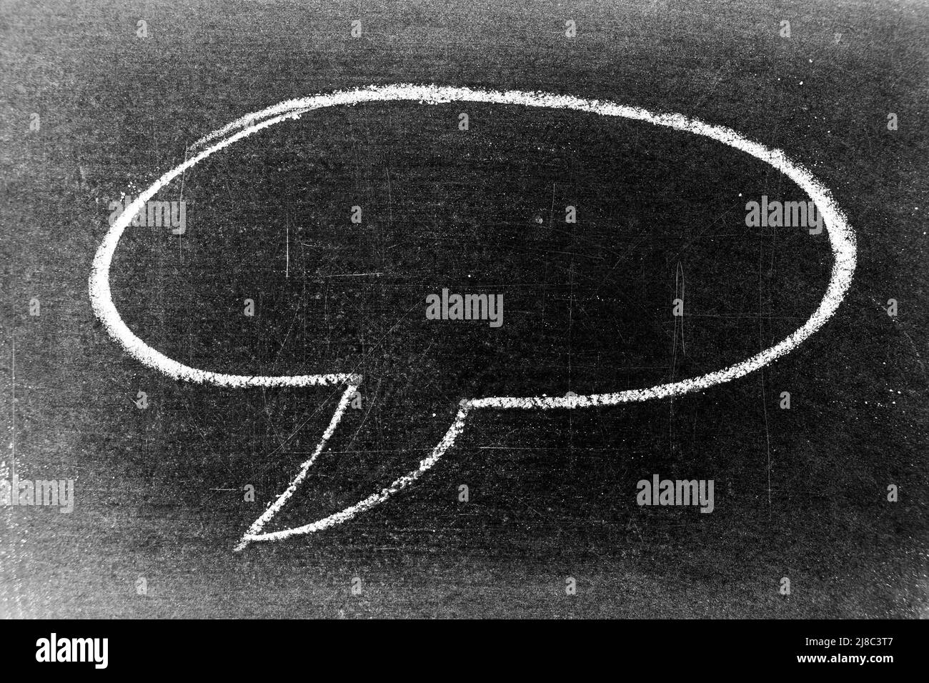 White color chalk hand drawing in round bubble speech shape with blank ...