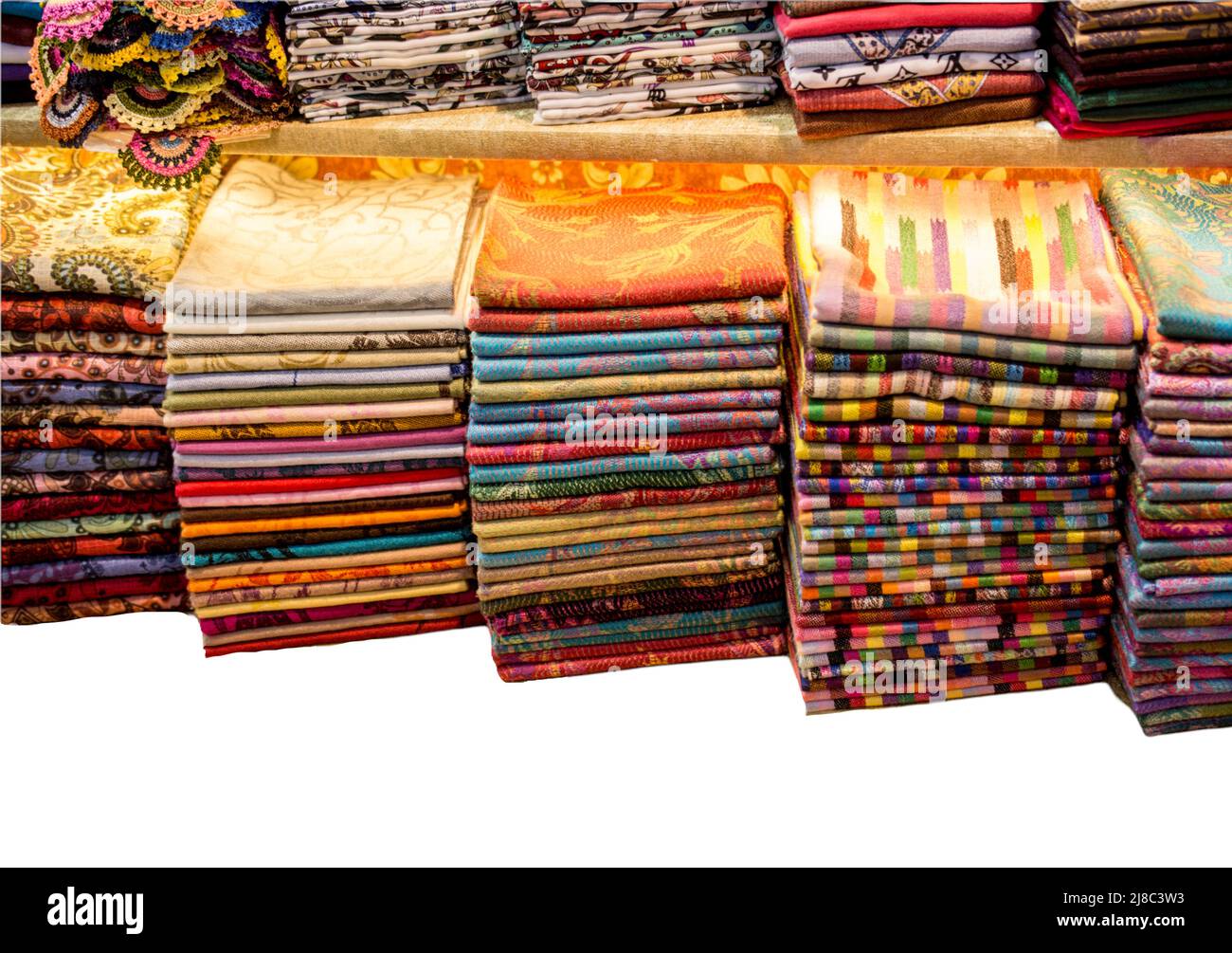 Sale of textiles and fabric on white background on the Turkish market ...