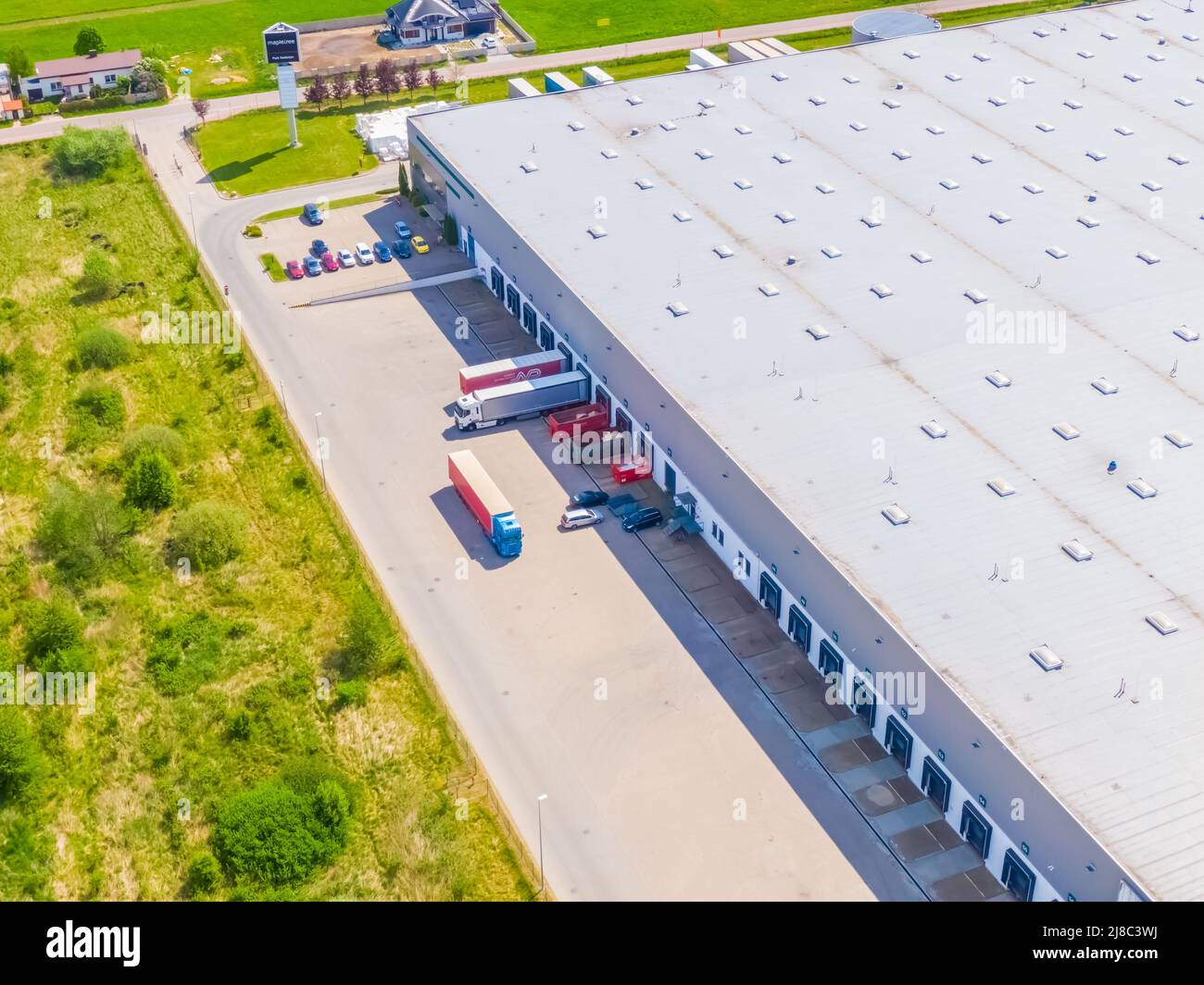 Aerial view of a logistics park with warehouse, loading hub and many ...