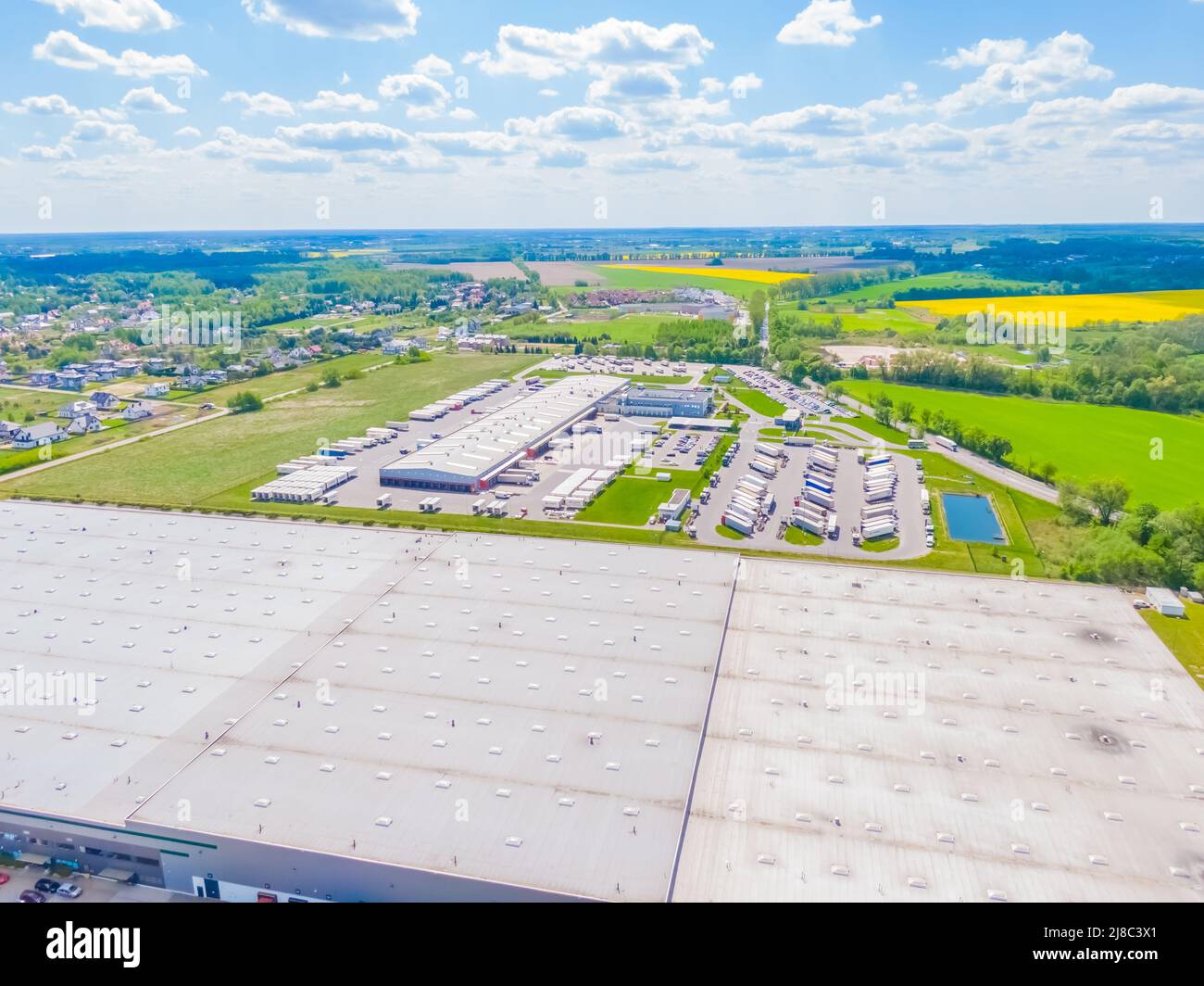 Aerial view of a logistics park with warehouse, loading hub and many ...