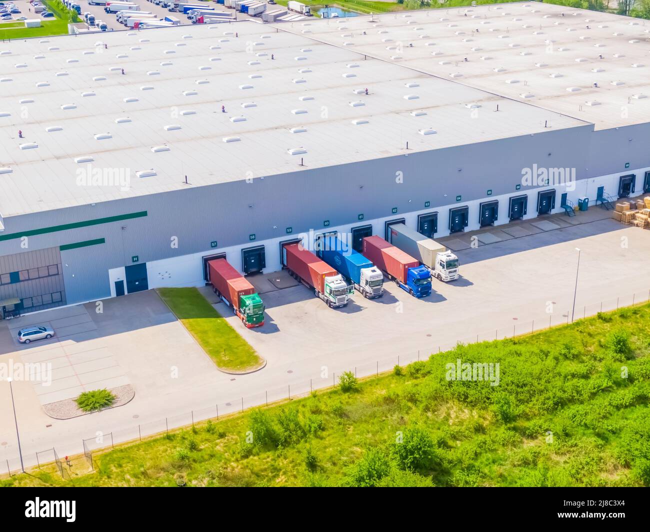 Aerial view of a logistics park with warehouse, loading hub and many ...