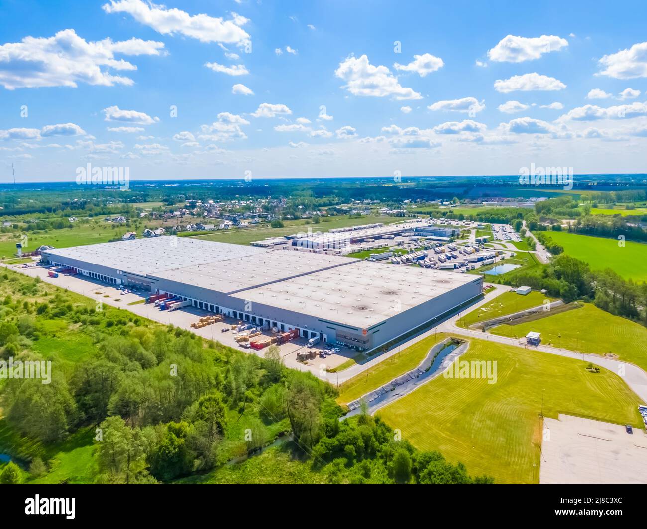 Aerial view of a logistics park with warehouse, loading hub and many ...