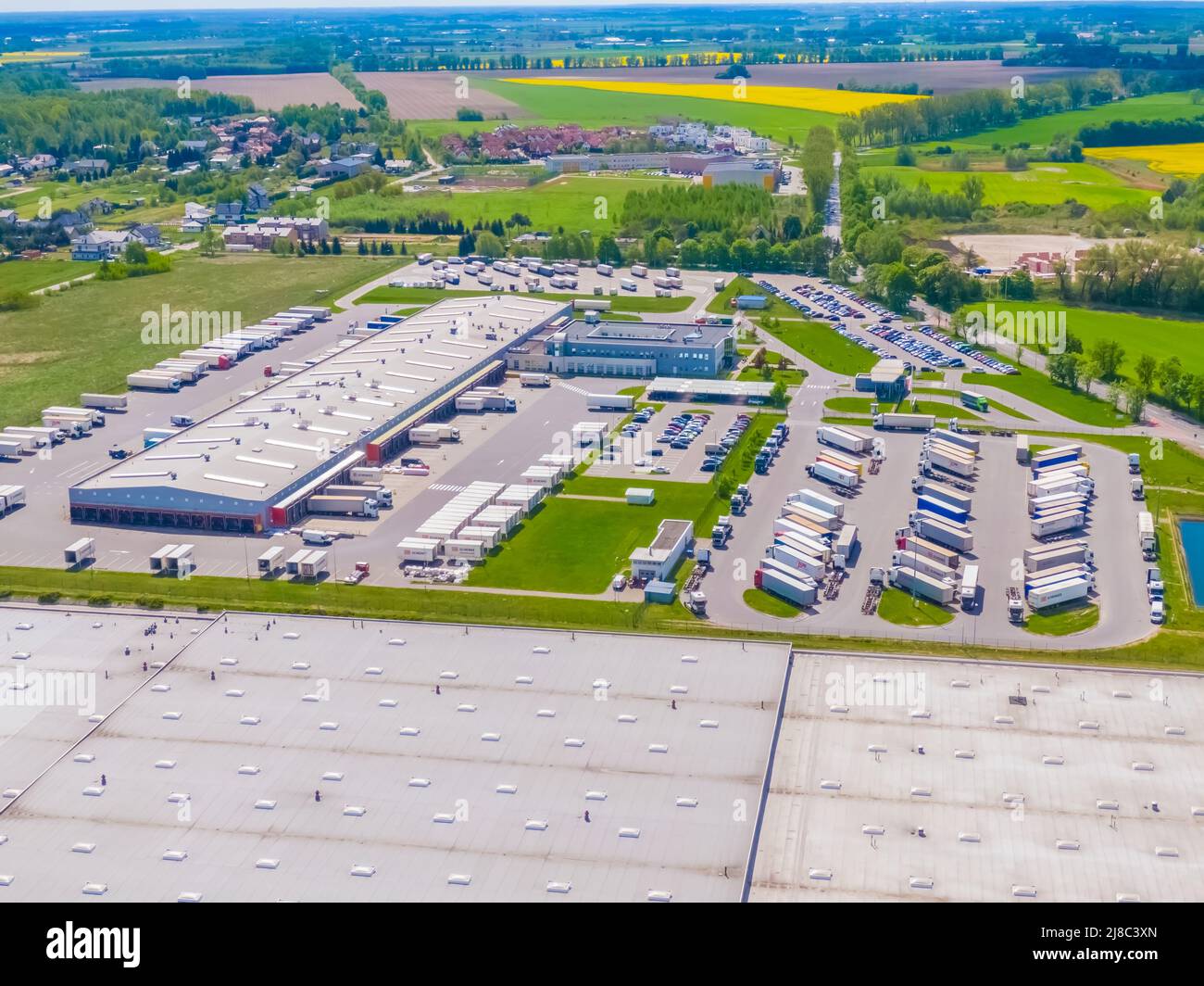 Aerial view of a logistics park with warehouse, loading hub and many ...