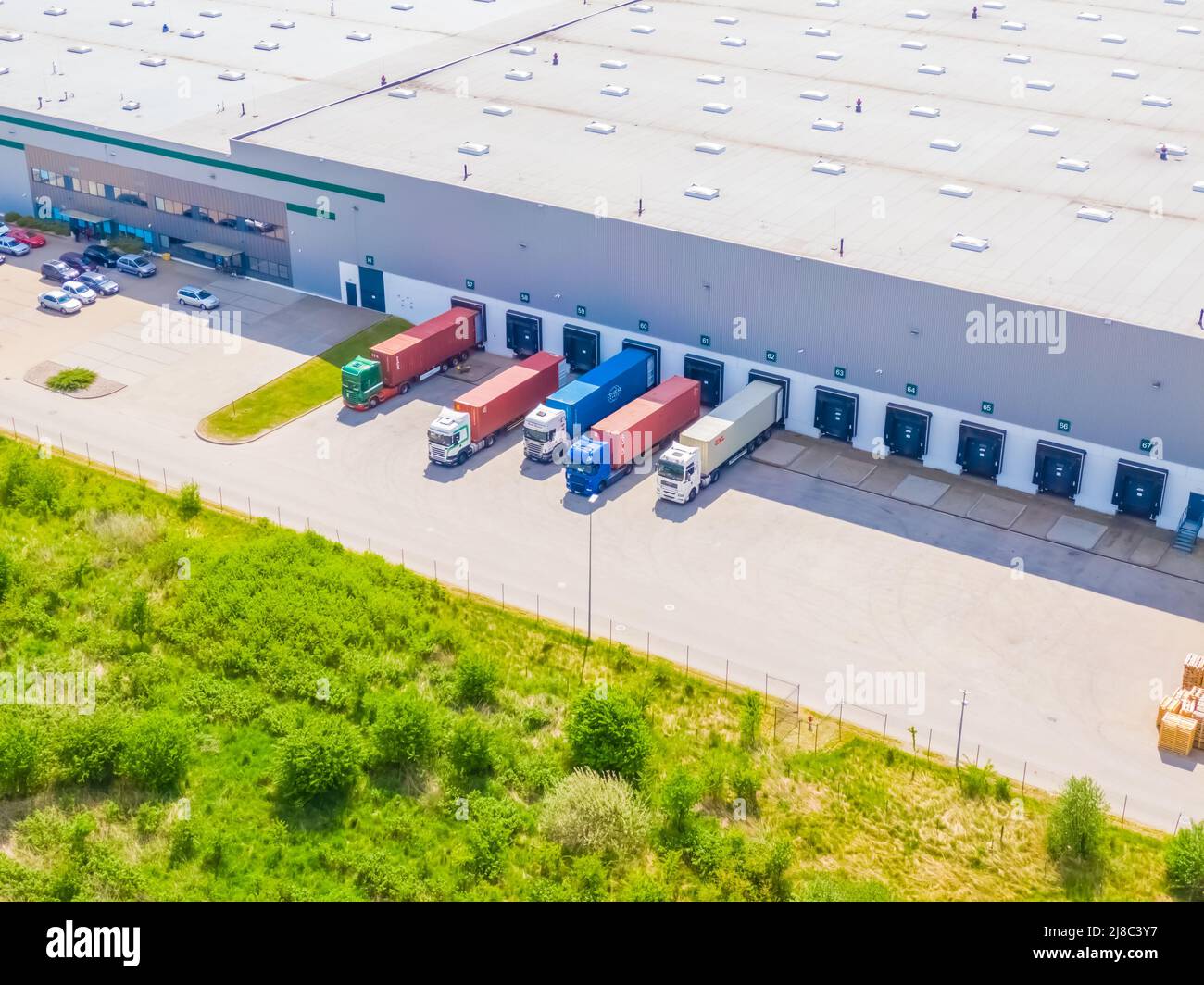 Aerial view of a logistics park with warehouse, loading hub and many ...