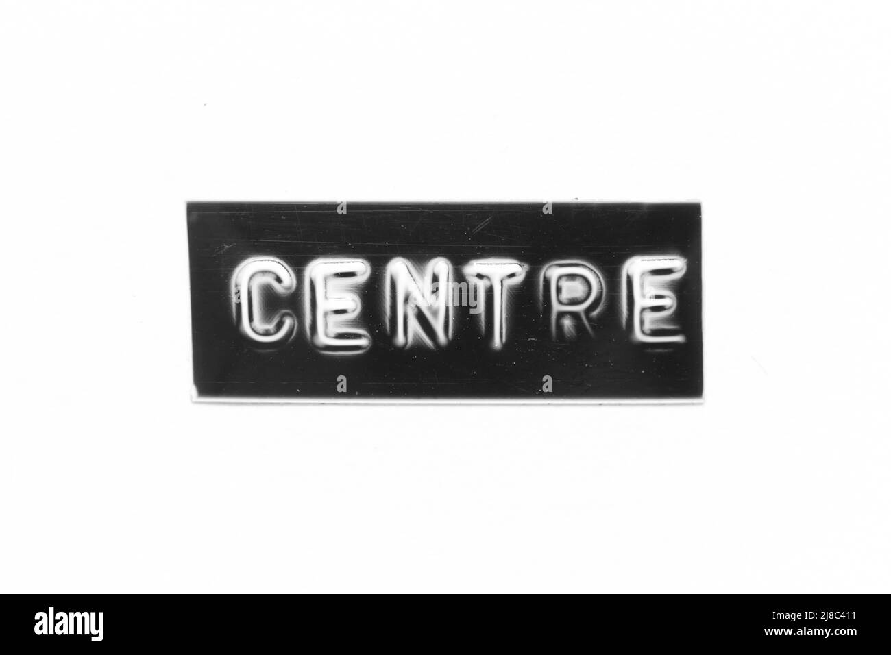 Black color banner that have embossed letter with word centre on white ...