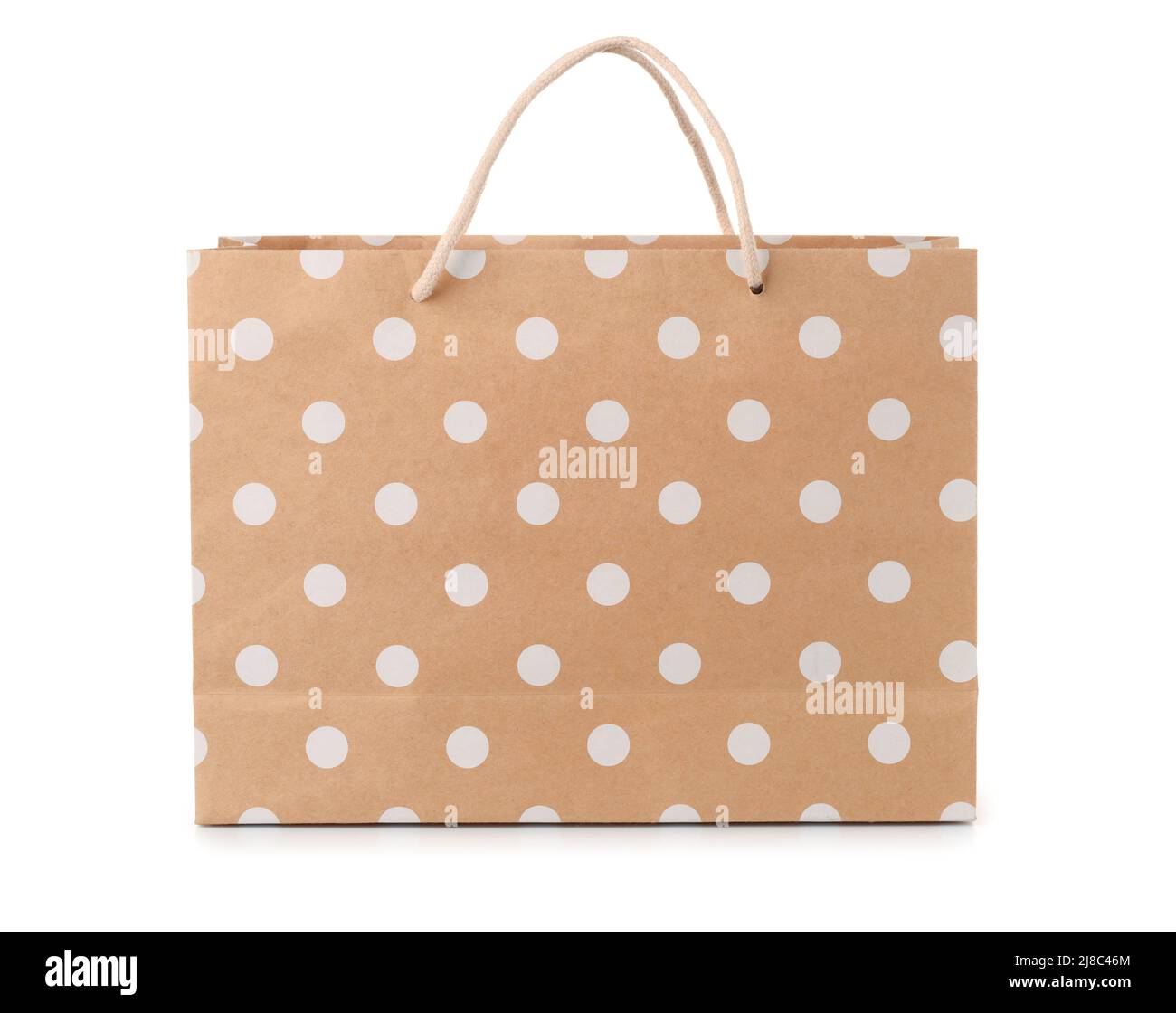 Side view of brown dotted paper shopping bag isolated on white Stock ...