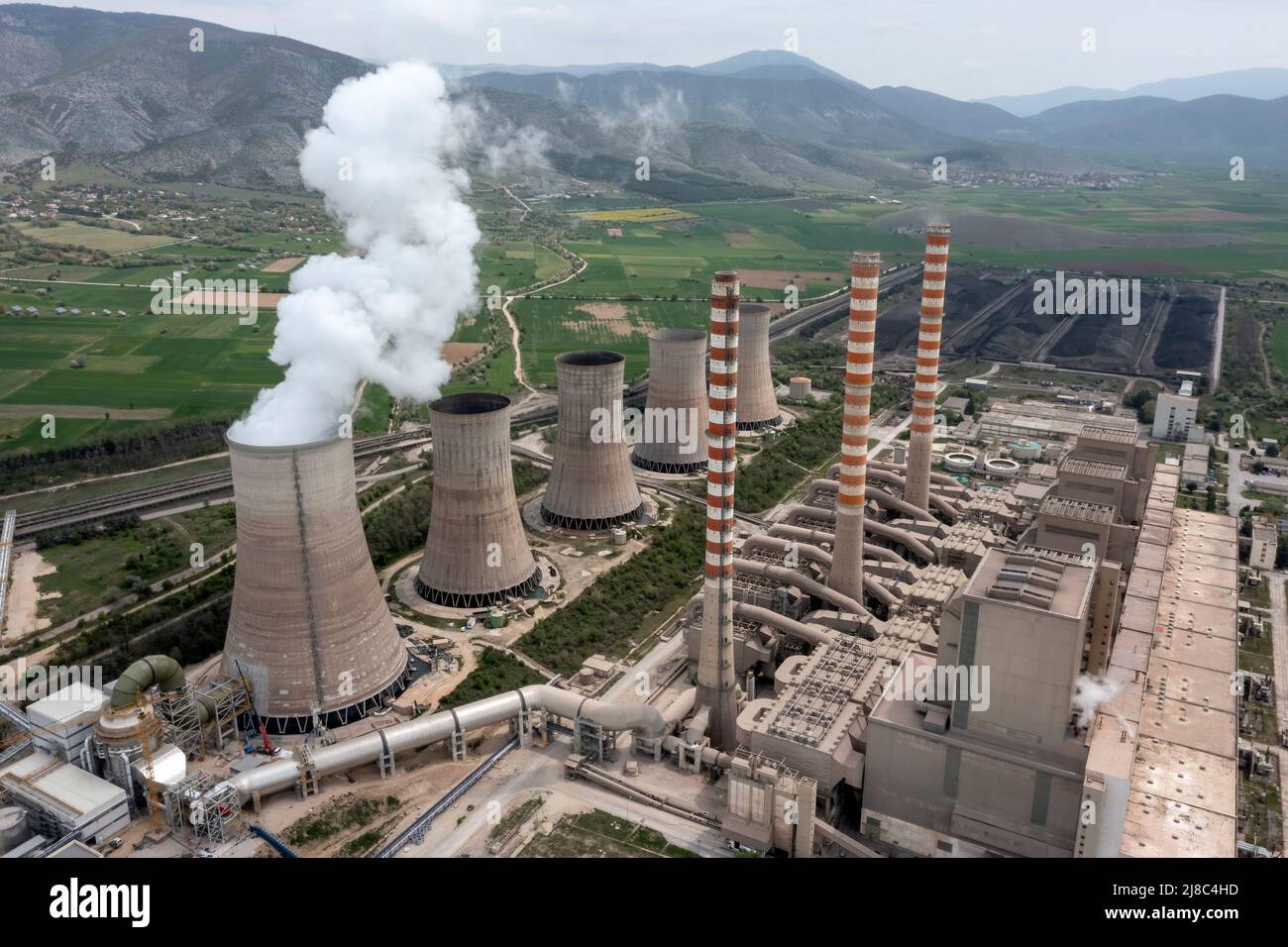 Aerial view the coal-fired power plant at Kozani in northern Greece ...