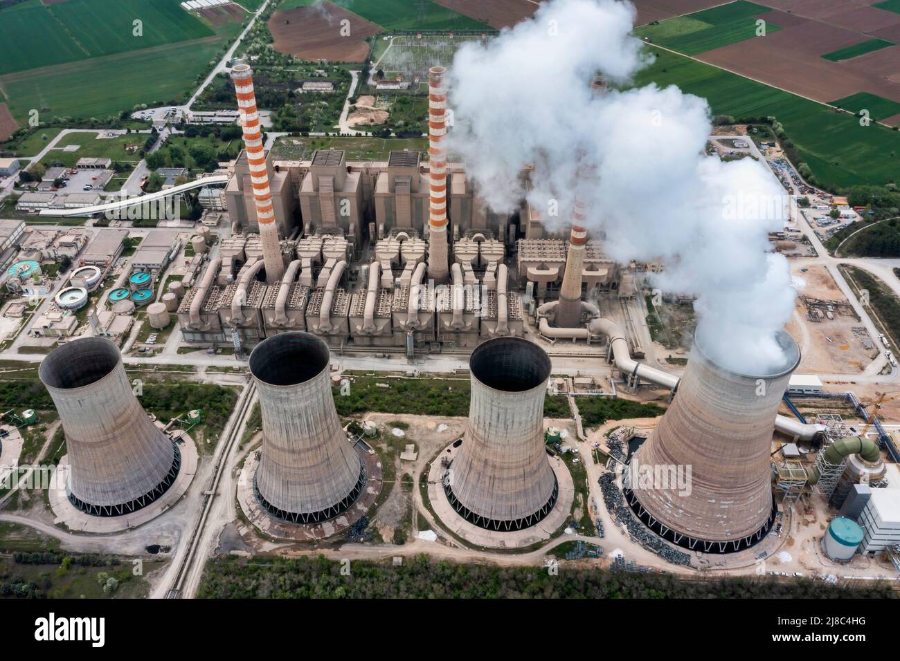 Aerial view the coal-fired power plant at Kozani in northern Greece ...