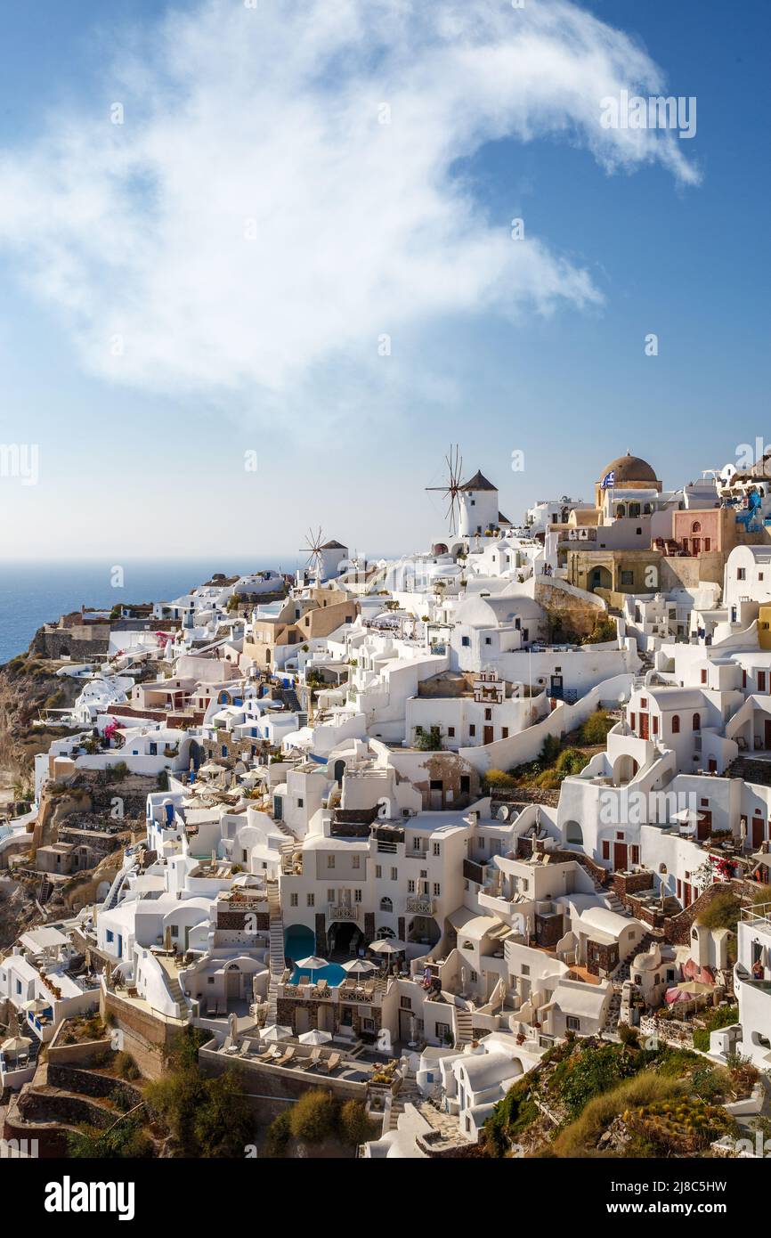 Traditional greek white houses on Santorini coast near the Aegean Sea ...