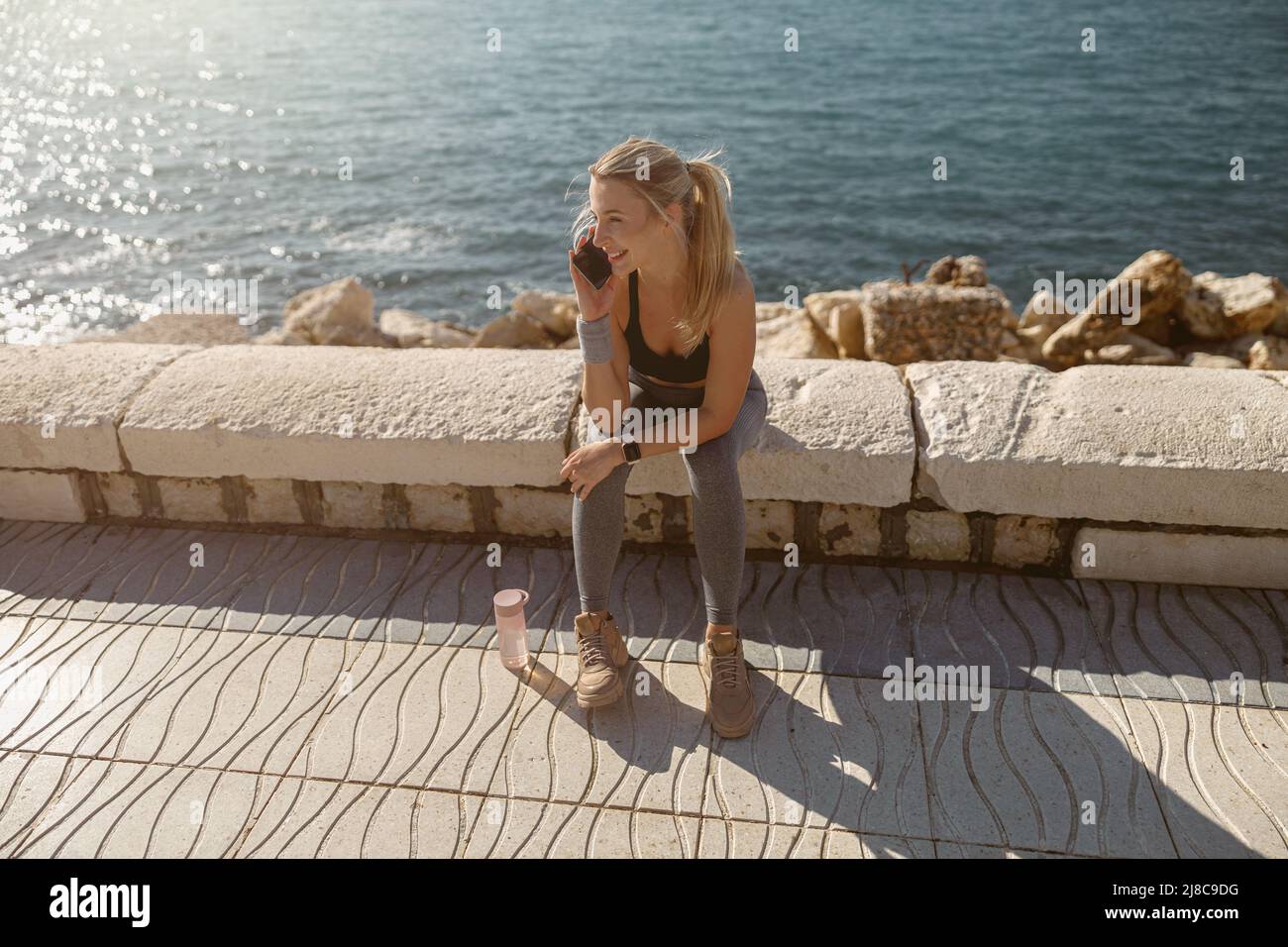 Young blonde woman engaged in hi-res stock photography and images - Alamy