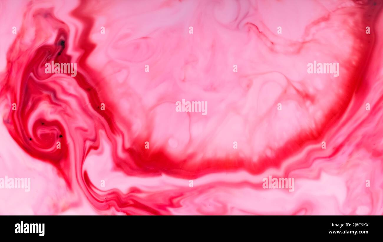 Pink liquid abstract surface. Colorful spots on a water surface. Fluid ...