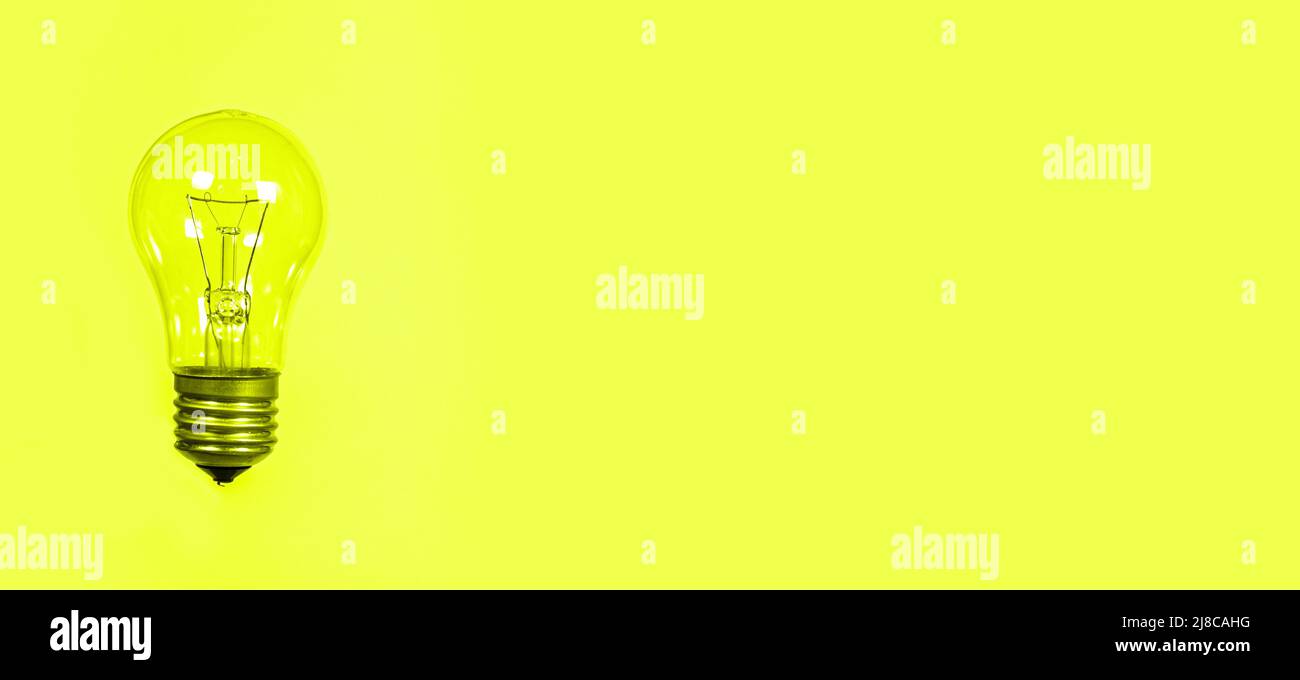 Bright yellow light bulb hi-res stock photography and images - Alamy