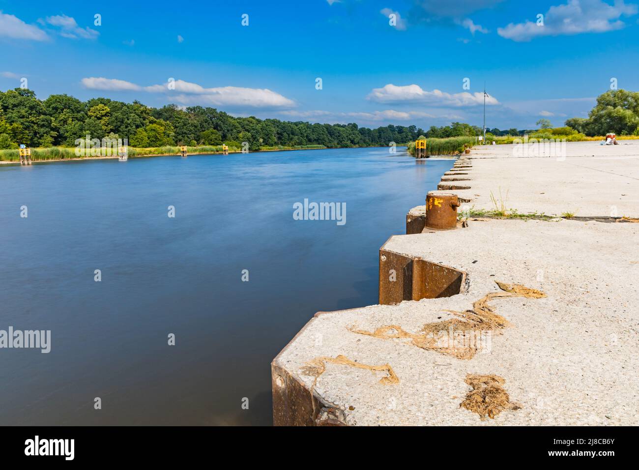 Silent river next to small wharf out of city center Stock Photo - Alamy