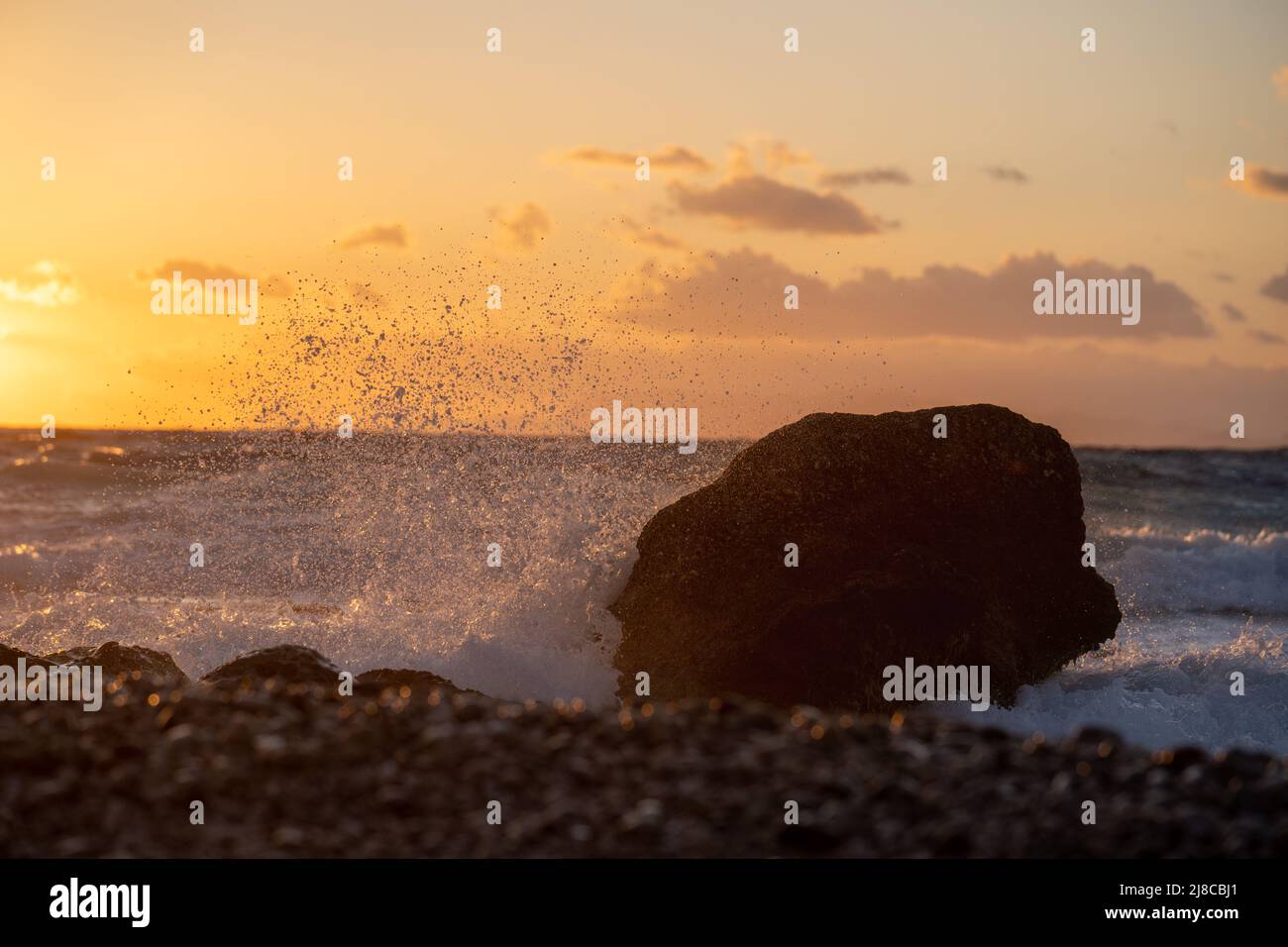 Hitting at wave hi-res stock photography and images - Alamy