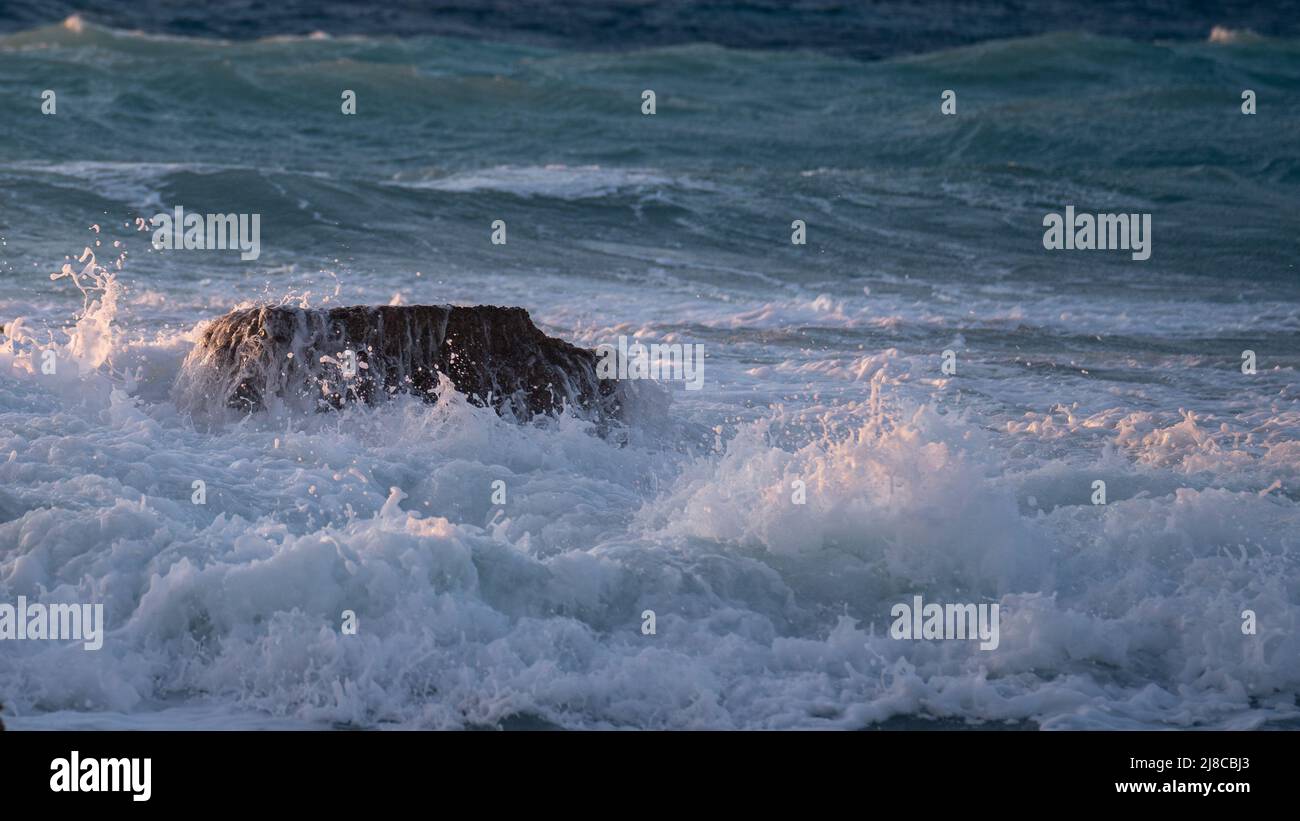Wave hitting rock beach hi-res stock photography and images - Alamy