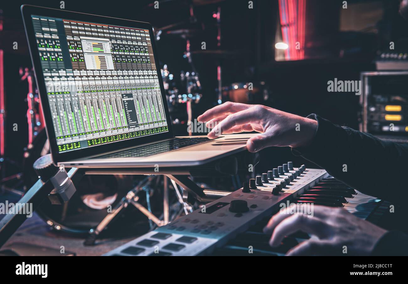 A man composer, producer, arranger, songwriter, musician hands ...
